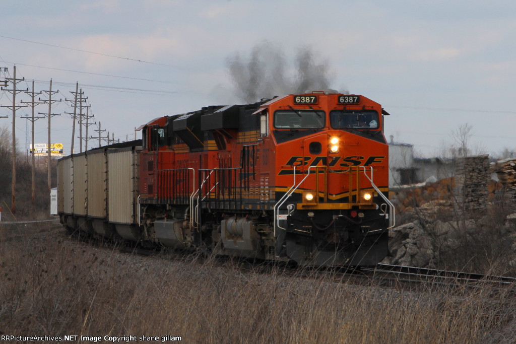 BNSF 6387 leads a slc load of coal at old monroe.